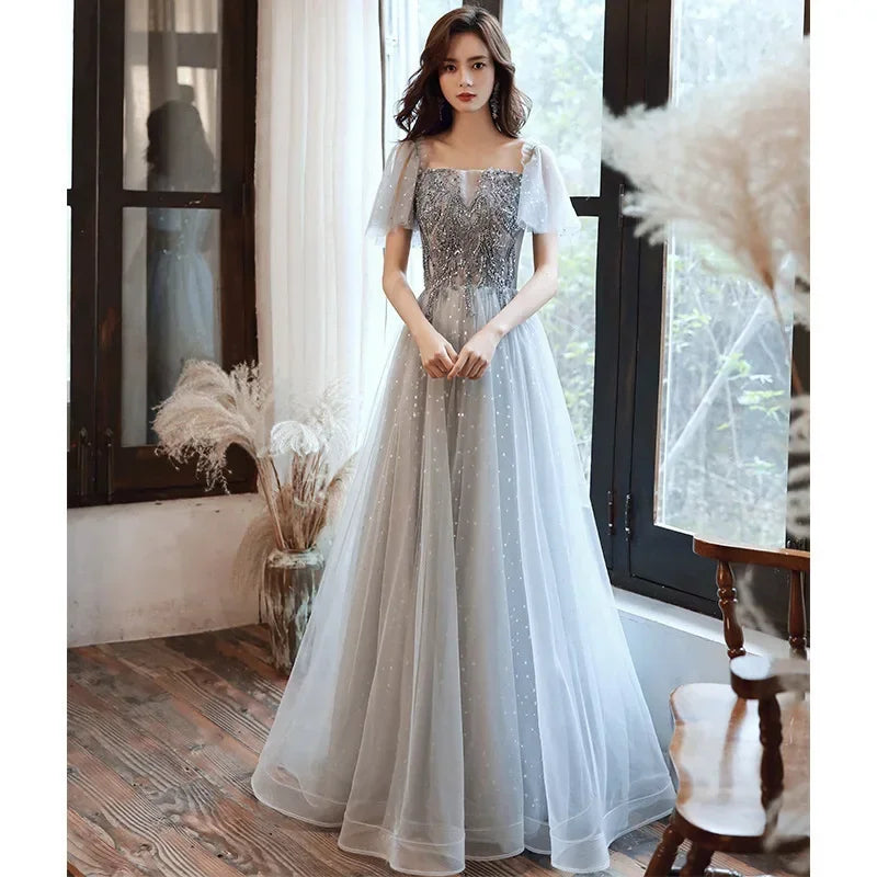 Sparkling Silver Gown With Sheer Sleeves Design on Luulla